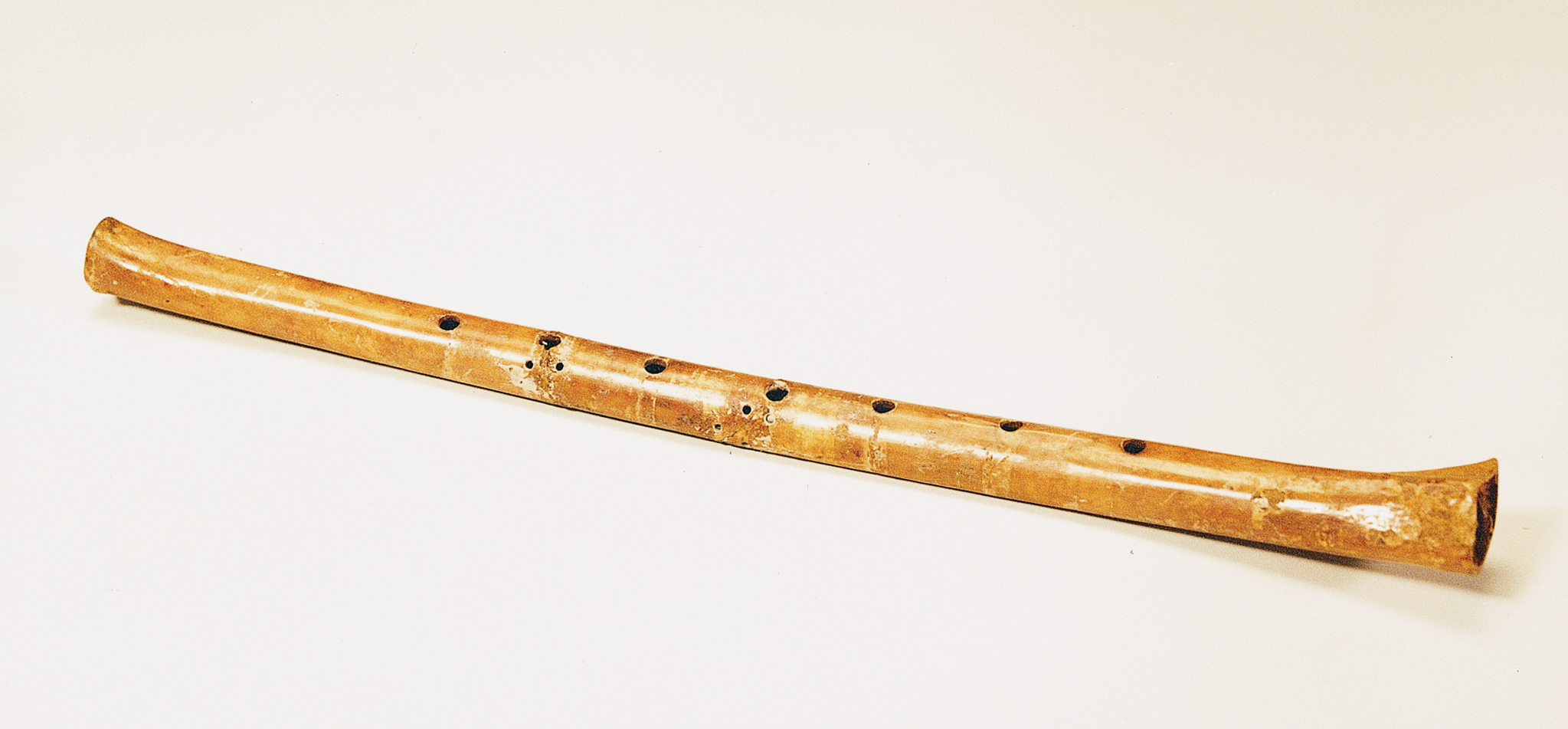 Metal bookmark with the image of Jiahu bone flute